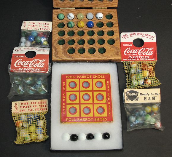 Bonhams : Collection of advertising marbles & boxes