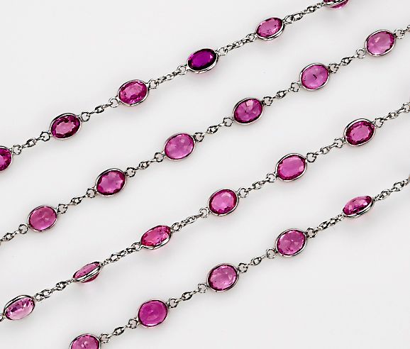 Bonhams : A pink sapphire and eighteen karat white gold long chain