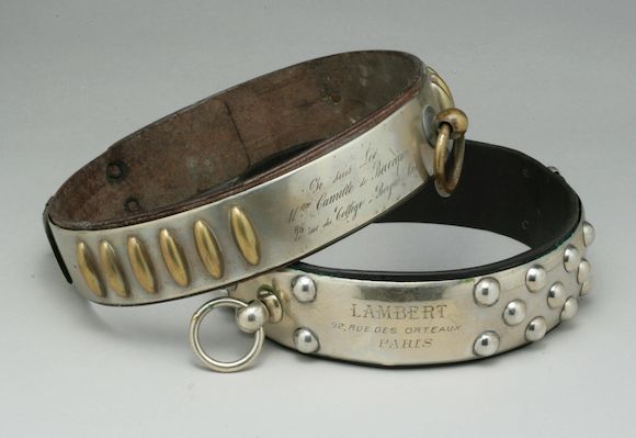 Bonhams : Two French silvered metal and leather collar with rounded studs