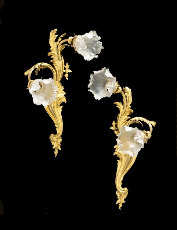 Bonhams : A pair of Louis XV style gilt bronze two light bras de lumière