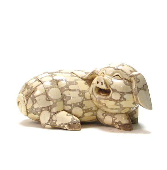 Bonhams : A carved and enameled bone veneer figure of a pig