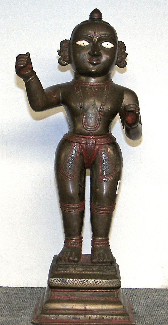 Bonhams : A painted brass Hindu deity with separately cast base