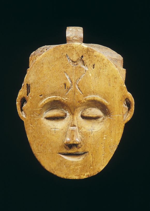 Bonhams : A fragment form a Fang janus helmet mask