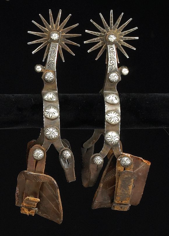 Bonhams : A pair of double-mounted and silver inlaid California style spurs