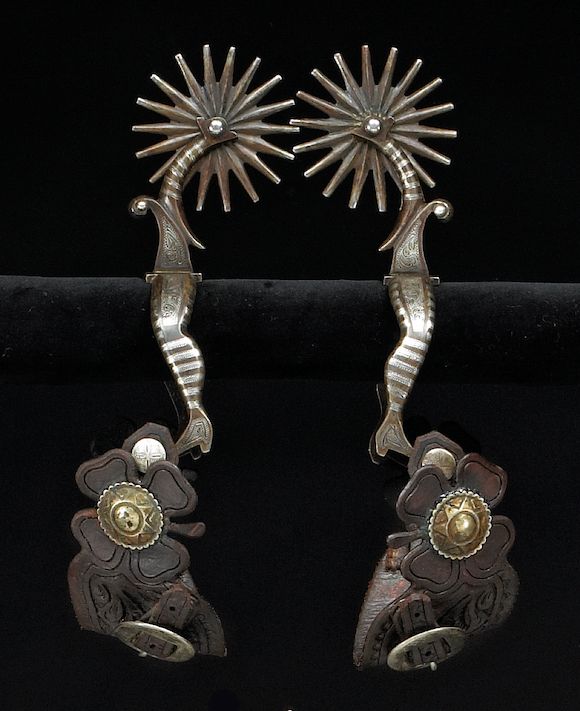Bonhams : A pair of silver-mounted gal leg spurs by Elmer Miller