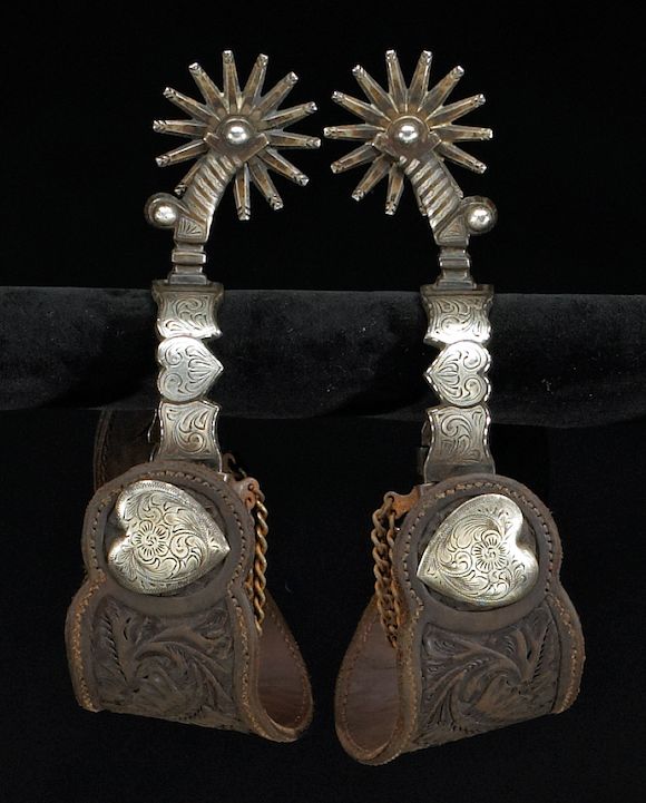 Bonhams : A pair of double-mounted California style spurs signed Garcia