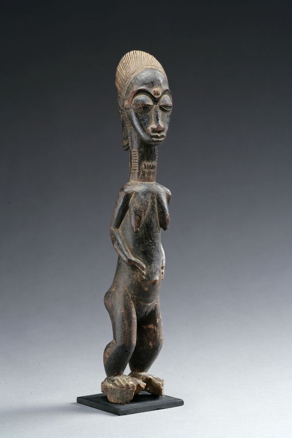 Bonhams : A Baule female figure