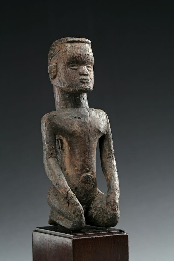 Bonhams : An unusual Teke kneeling figure