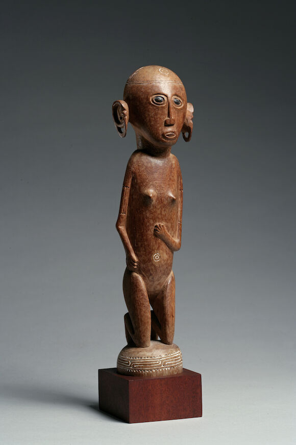 Bonhams A Massim Kneeling Figure