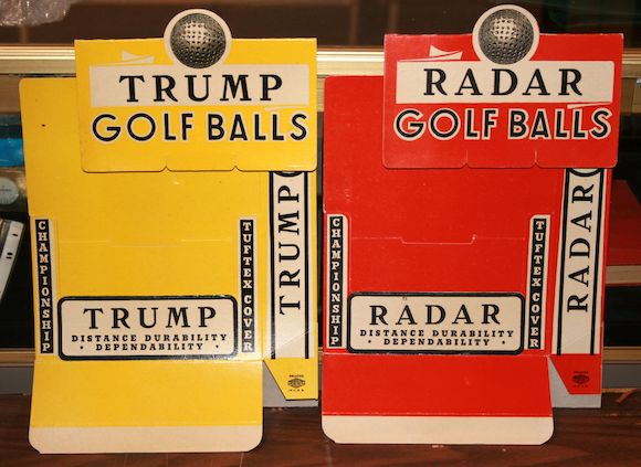 Bonhams : A pair of golf ball counter display units,