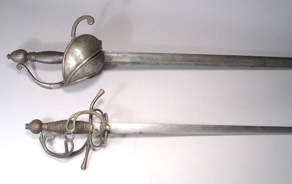 Bonhams : A lot of two reproduction swept hilt swords