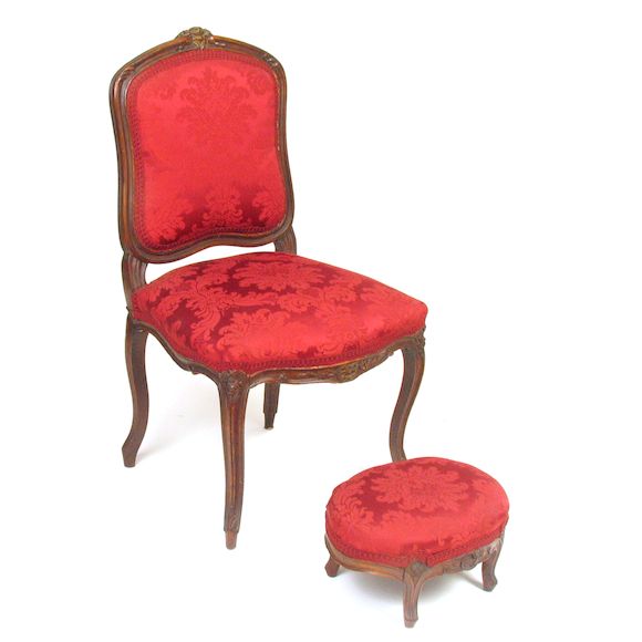 Bonhams : A French Rococo style walnut chair with stool