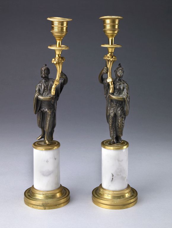 Bonhams : A pair of French gilt and patinated bronze figural candlesticks
