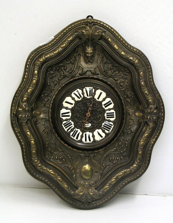 Bonhams : A Renaissance style repousse gilt metal wall clock