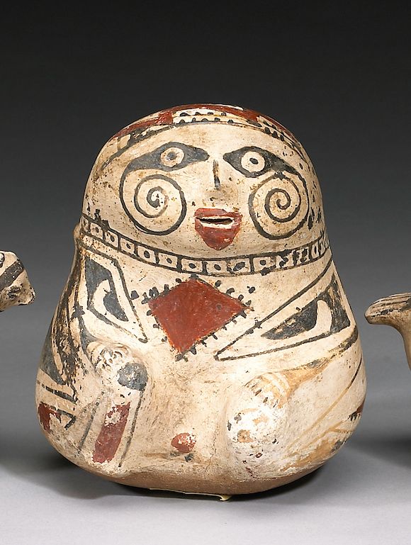 Bonhams : A Casas Grandes polychrome human effigy jar
