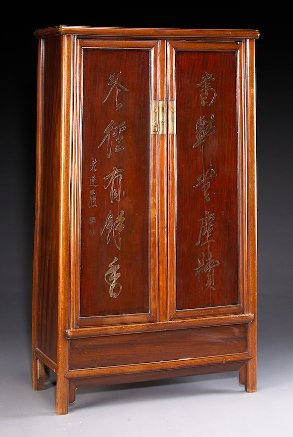 Bonhams : A yumu sloping style cabinet (yuan jiao gui) 18th Century