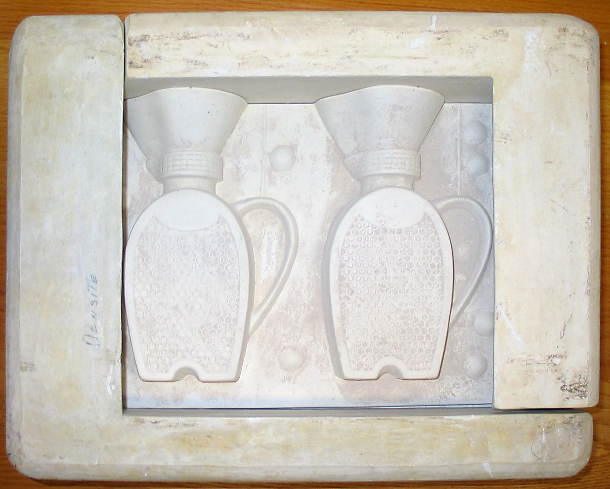 Bonhams Cars : Two Bugatti pitcher molds,