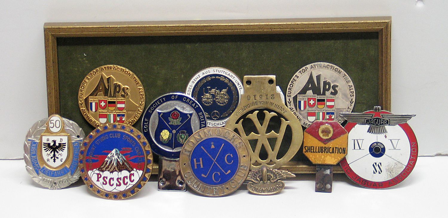 Bonhams Cars : A collection of badges and plaques,