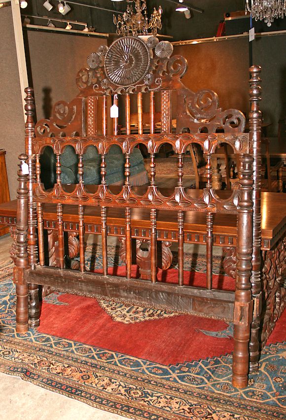 Bonhams : A Spanish Baroque style walnut headboard and footboard
