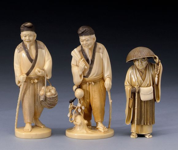 Bonhams : Three stained ivory figural okimono