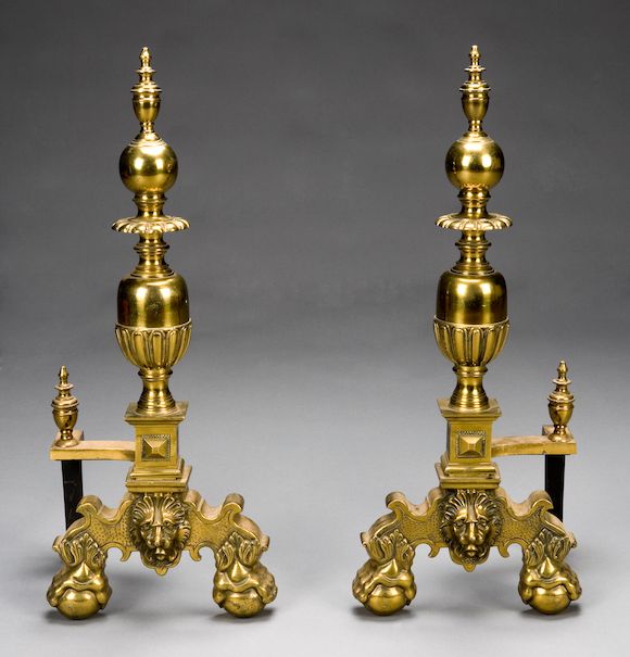 Bonhams : A pair of Baroque style brass andirons