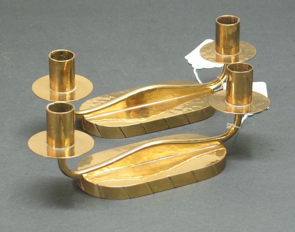 Bonhams : A pair of William Van Erp (1901-1971) brass two light candelabra