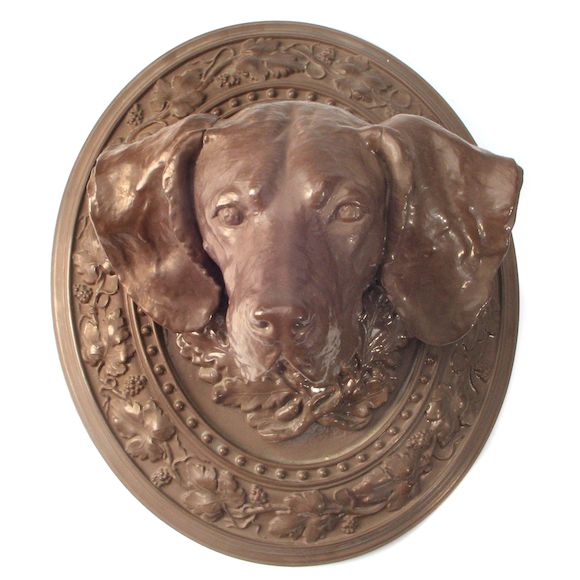 Bonhams : A cast iron paint decorated bust of a hound