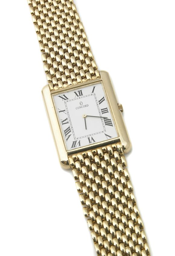 Bonhams : A 14k gold Concord link bracelet wristwatch,