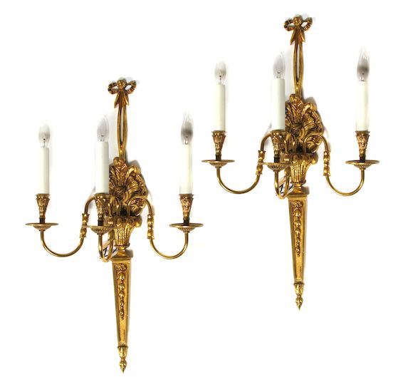 Bonhams : A set of four Neoclassical style gilt bronze bras de lumiere