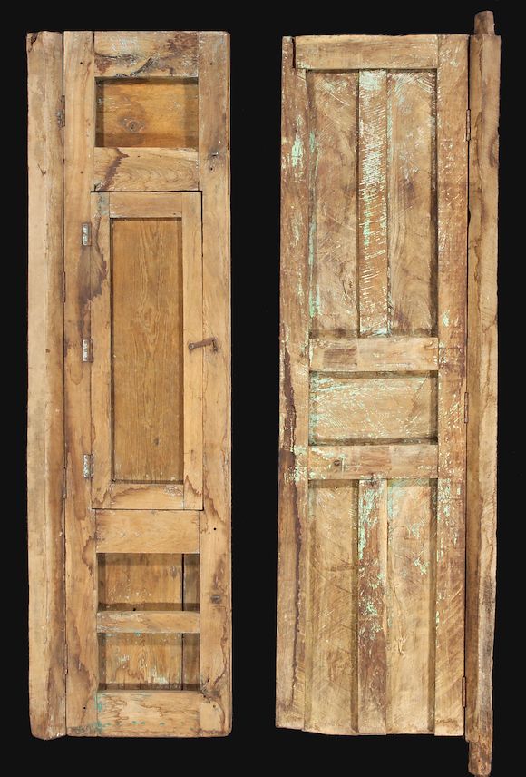 Bonhams : A group of Continental mixed wood rusticated doors