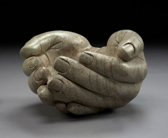 Bonhams : A carved marble basin