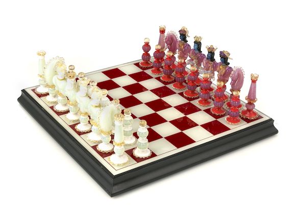 Bonhams : A Venetian iridescent glass and ebonized wood figural chess set