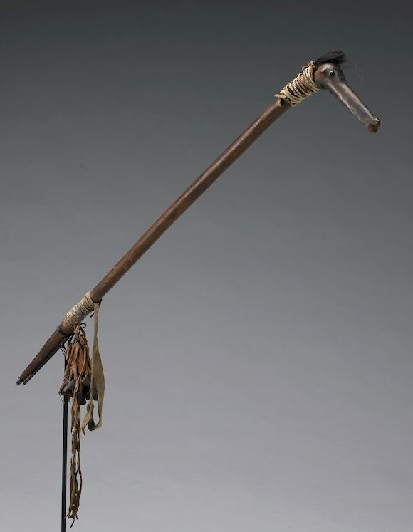 Bonhams : An Arapaho Tomahawk Society effigy stick