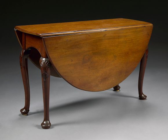 Bonhams : A George III mahogany drop flap dining table