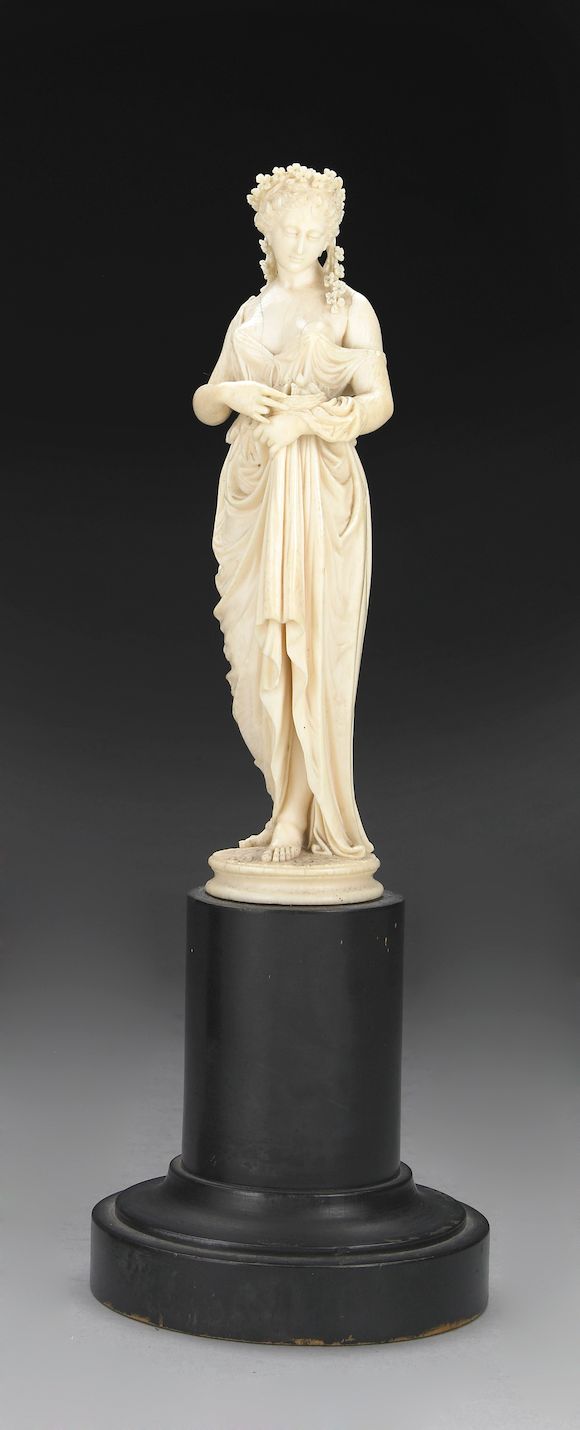 Bonhams : A French carved ivory figure of a maiden