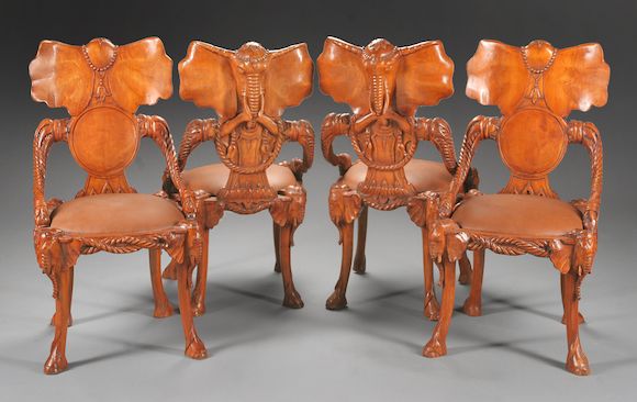 Bonhams : A set of four Continental carved wood elephant chairs