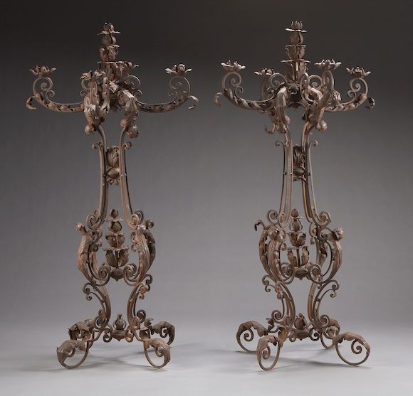Bonhams : A pair of Baroque style cast iron and tole torcheres