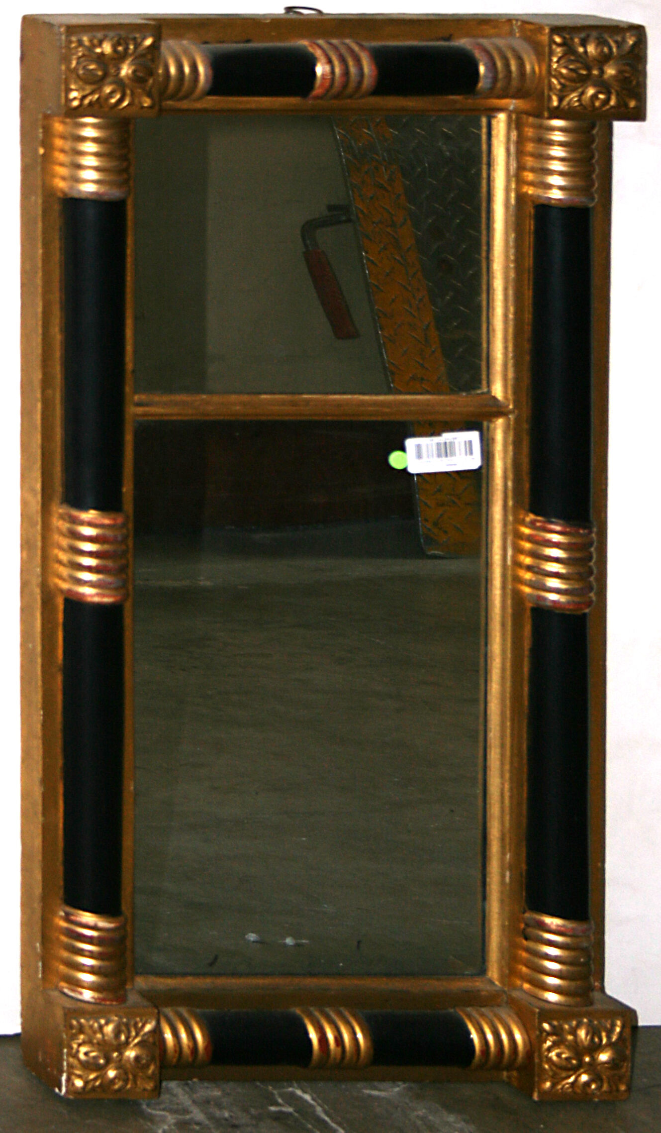 Bonhams : An American Classical parcel gilt ebonized mirror