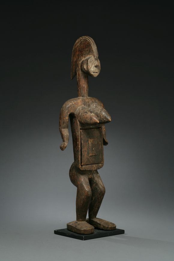 Bonhams : A fine Igala anthropomorphic mirror box