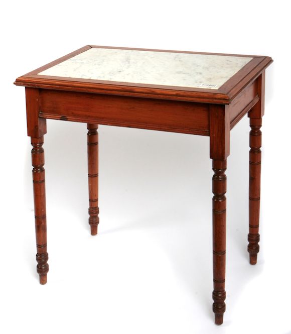 Bonhams : A pine table with marble inset top