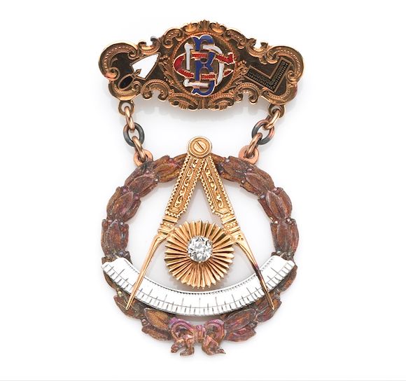 Bonhams : A diamond and enamel Masonic brooch,