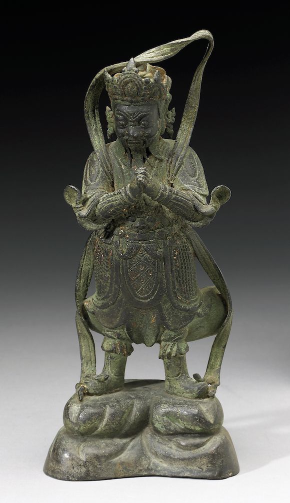 Bonhams : A cast bronze figure of a guardian general Ming dynasty