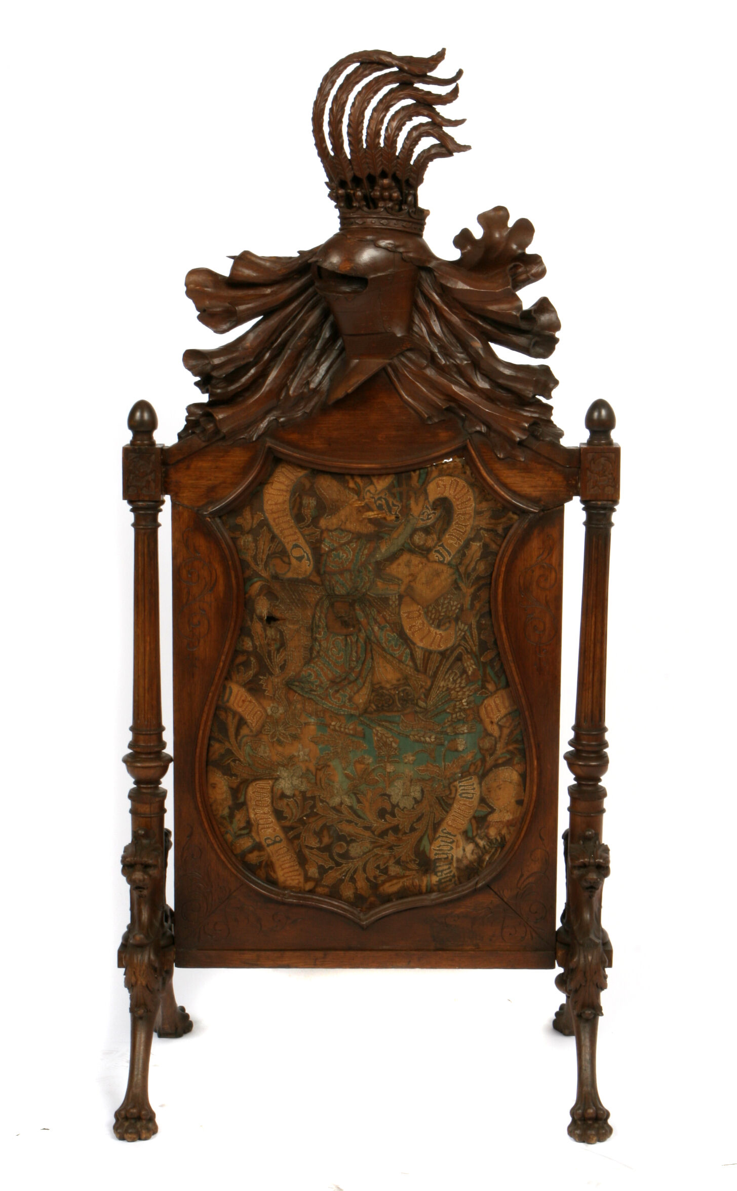 Bonhams : A Continental carved walnut firescreen with heraldic design