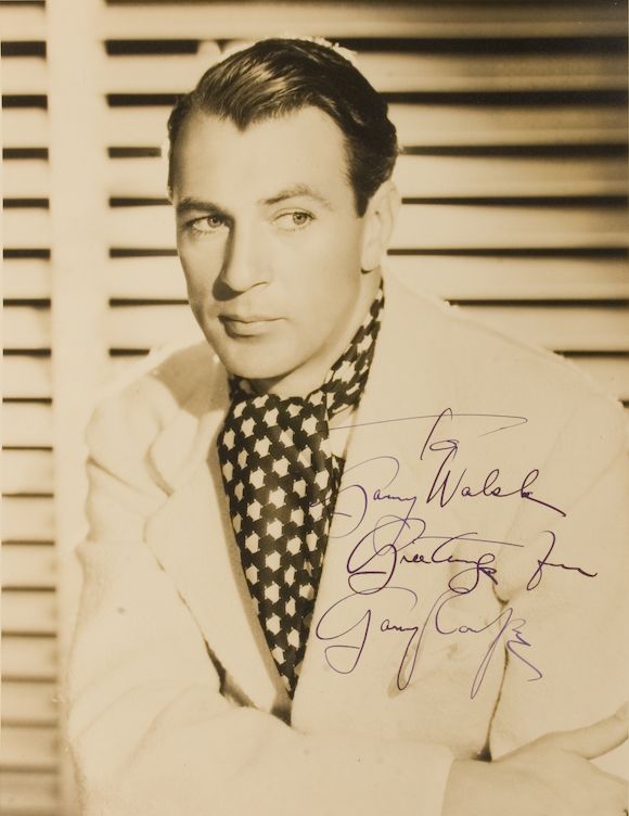 Bonhams : A Gary Cooper signed sepia photograph, 1930s