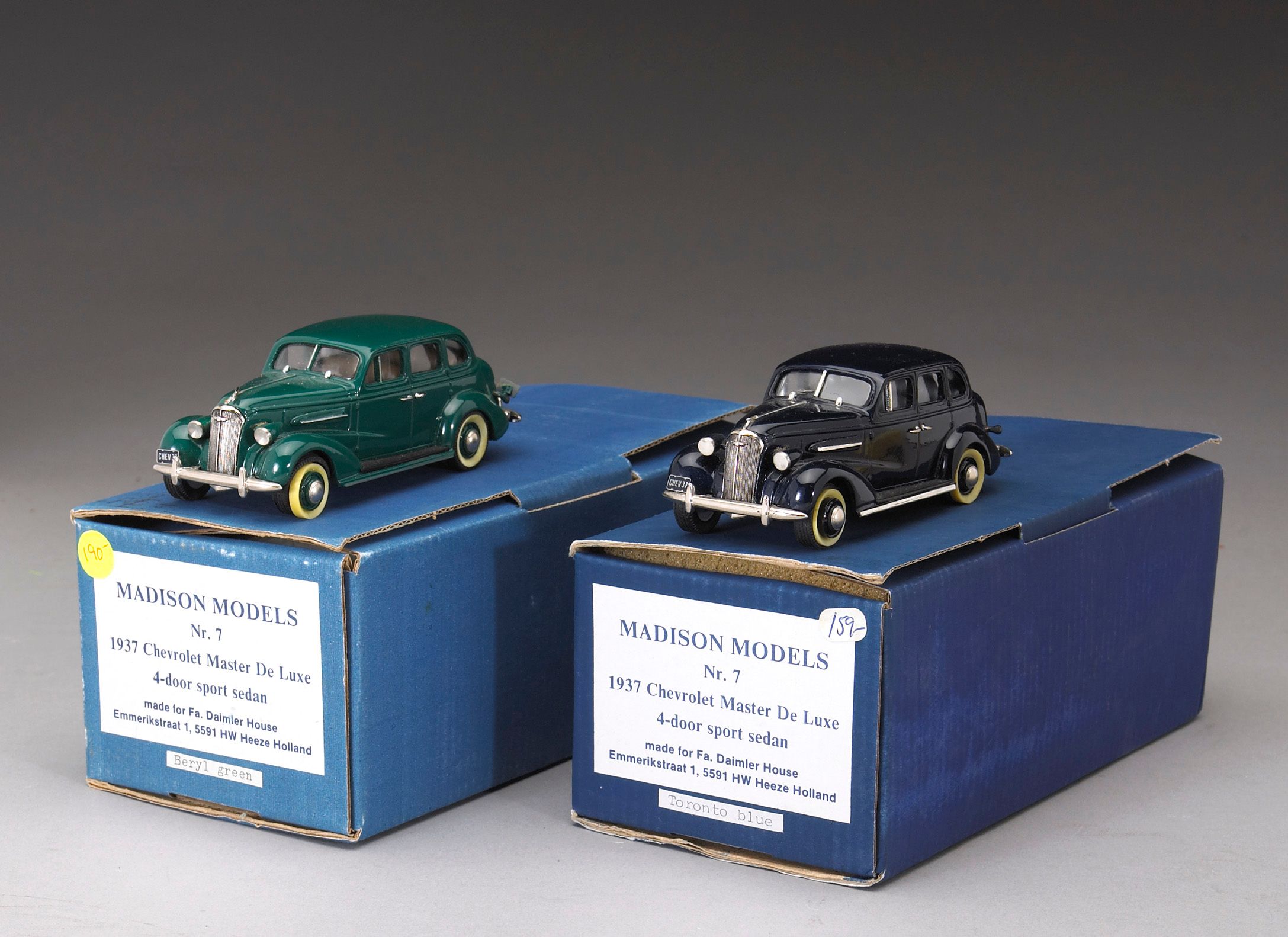 Bonhams Cars : Two 1:43 scale white metal model cars, by Madison models ...