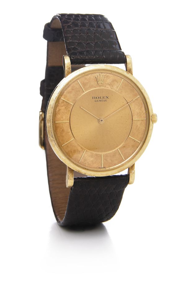 Bonhams : Rolex. An unusual 18k gold wristwatch in slim dust-proof ...