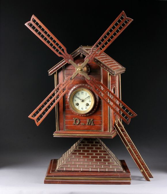 Bonhams : A Continental bronze and brass mounted walnut windmill clock