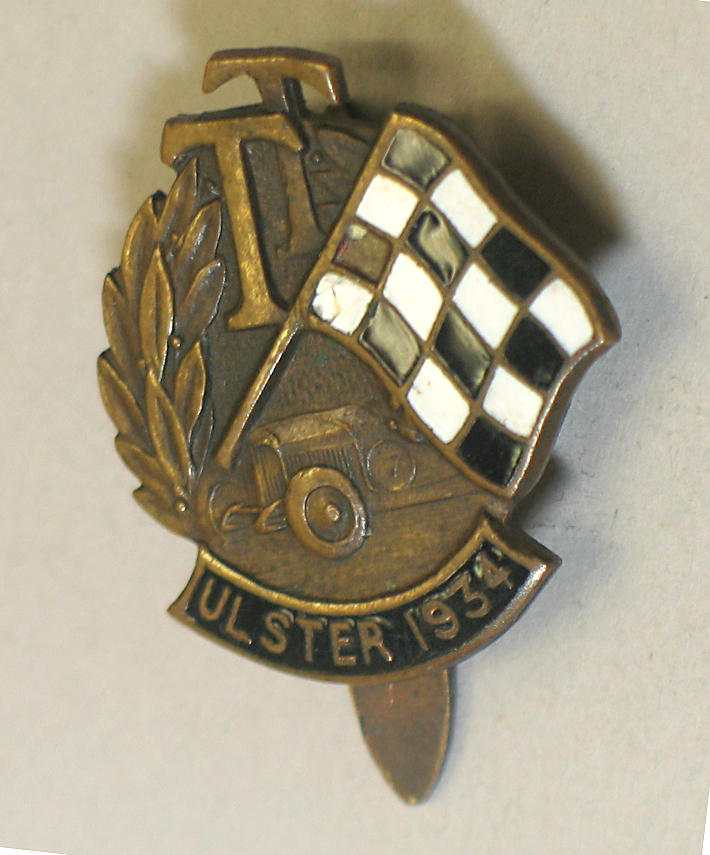 Bonhams Cars : A 1934 Ulster TT enamelled lapel badge,
