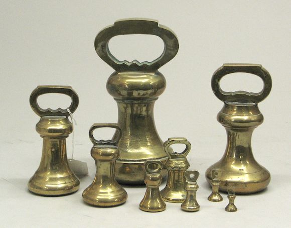 Bonhams : An assembled graduated set of English brass bell weights