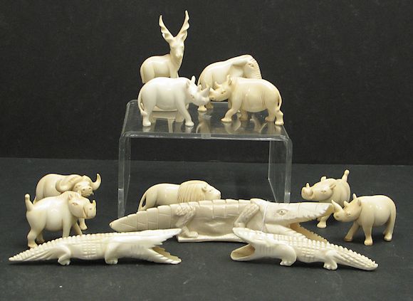 Bonhams : An assembled group of thirteen African carved ivory animals